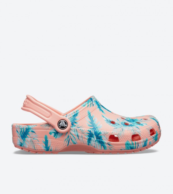 Crocs | Classic Seasonal Graphic Round Toe Clogs | 6TH STREET.COM